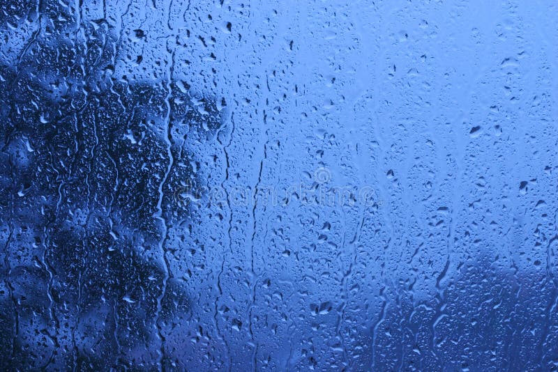 Raindrops on window stock photo. Image of blue, glass - 2562078
