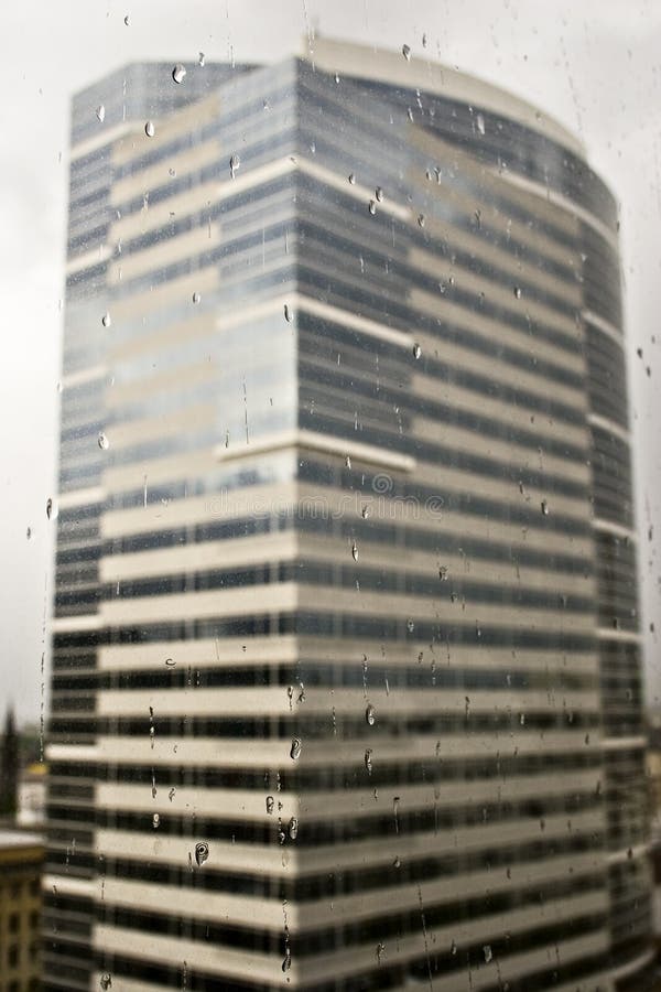 Raindrops in Window, Building in Background Stock Photo - Image of ...