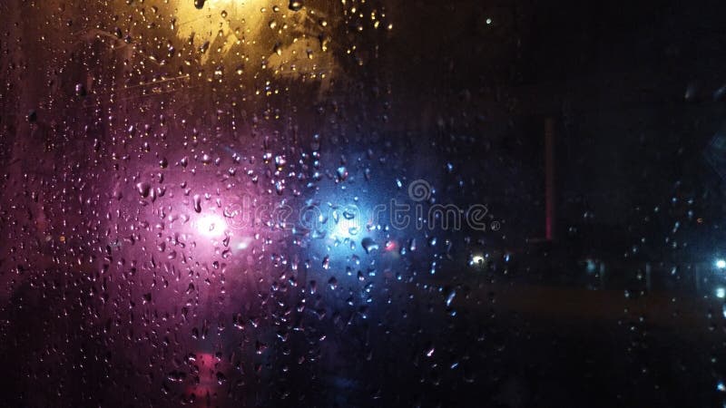 Raindrops on the Window in the Dark, There are Several Bright Lanterns ...