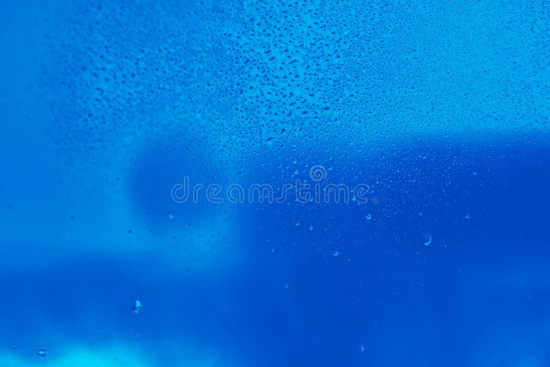 Raindrops on Window Glass. Blue Color Gradient Background Stock Image ...