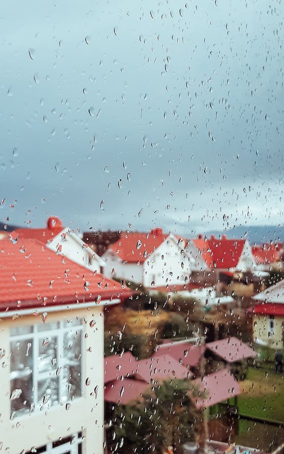 Raindrops on the Window. Outside the Window Streetscape Stock Photo ...