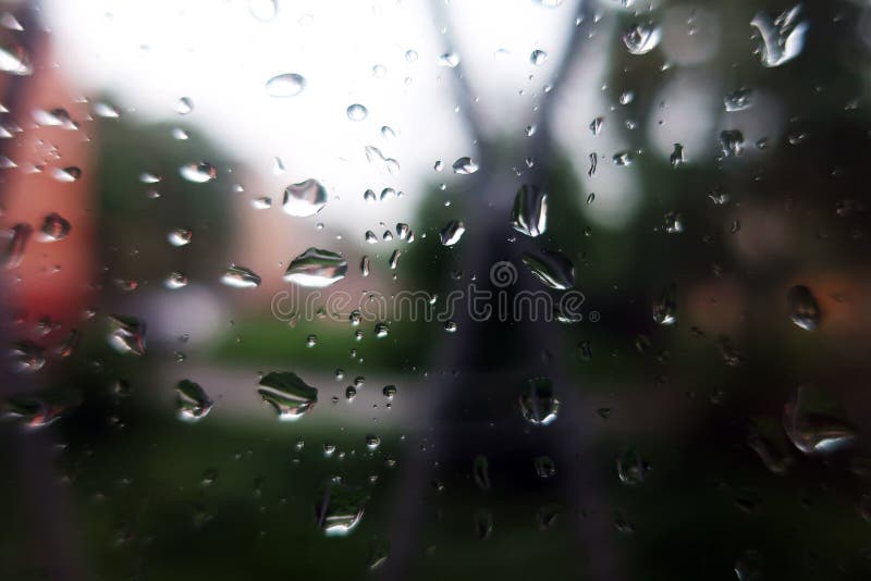 Raindrops on window pane stock image. Image of flood - 186294147