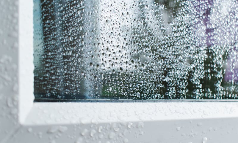 Raindrops on the window stock photo. Image of drop, aqua - 257561368