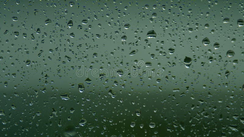 Raindrops on the Window. Water Drops Descend on the Window in Rainy ...