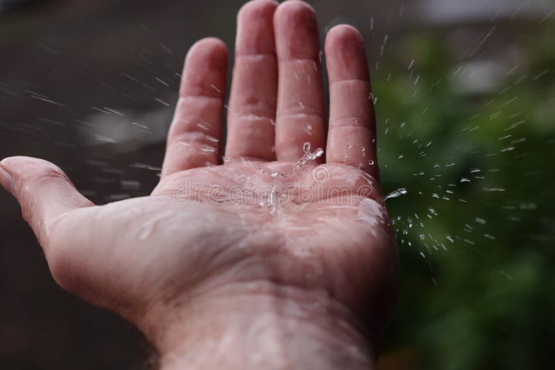 Rainfall Splashing on a Hand Stock Image - Image of wash, fingers ...