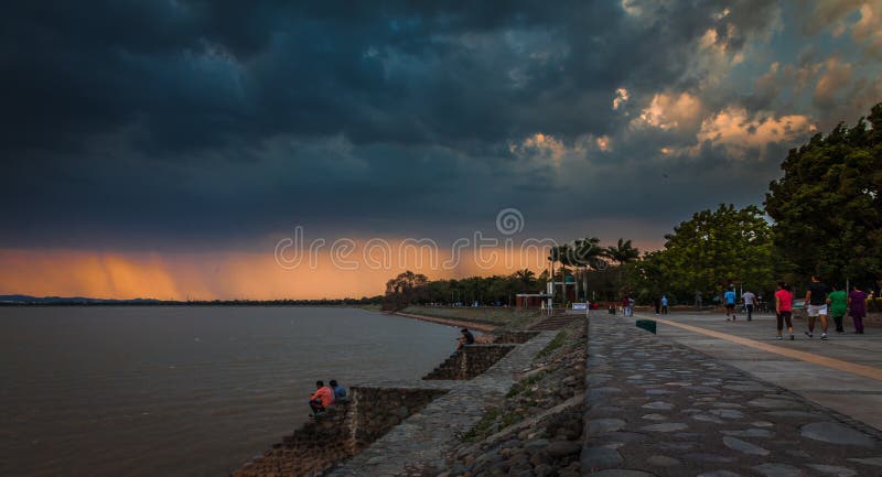 Raining across the lake. editorial stock photo. Image of lake - 71138103