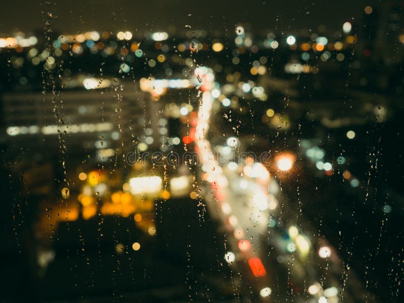 Raining Cityscape at Night from Windows. Stock Image - Image of city ...