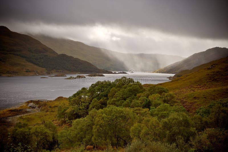 Raining on the lake stock photo. Image of cloudy, peace - 3992994