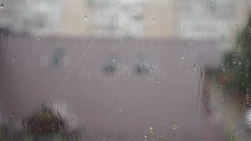It is Raining Outside the Window. Misty Window Glass Stock Footage ...