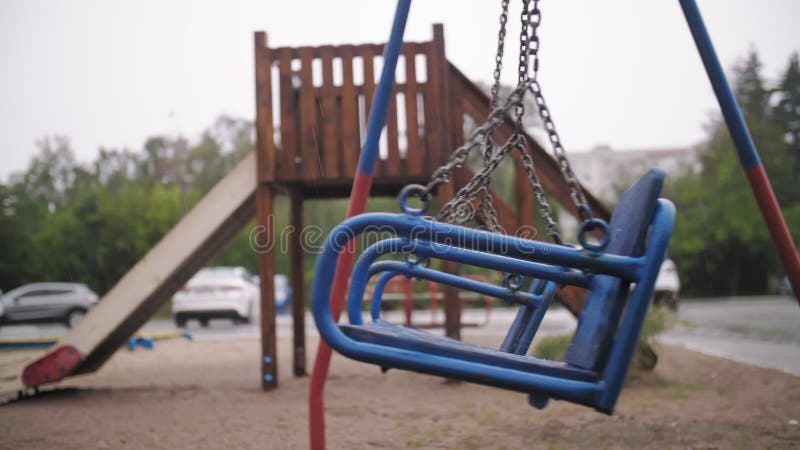 Raining on Playground. Close-up Stock Video - Video of raindrops ...