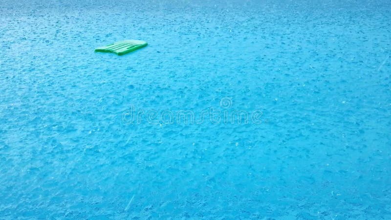 Raining at swimming pool stock video. Video of chlorinated - 115656517