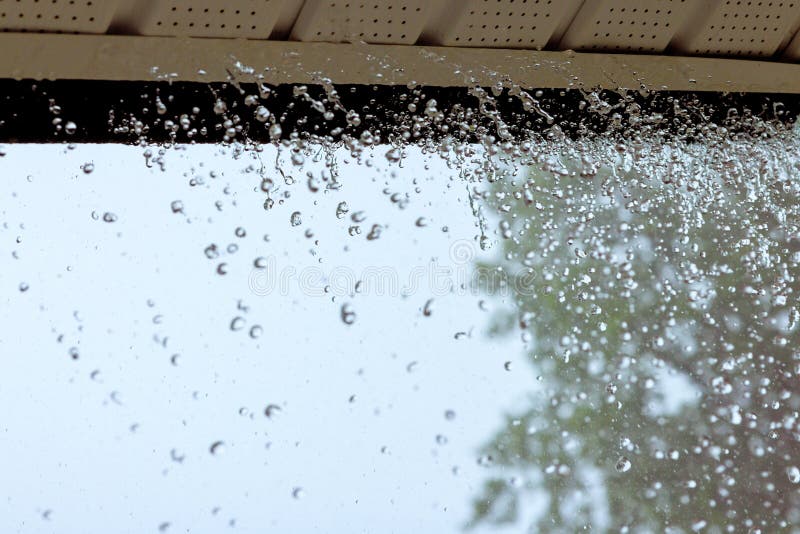 When it Rains Heavily, Water Pours Out of the Over Gutters. Stock Photo ...
