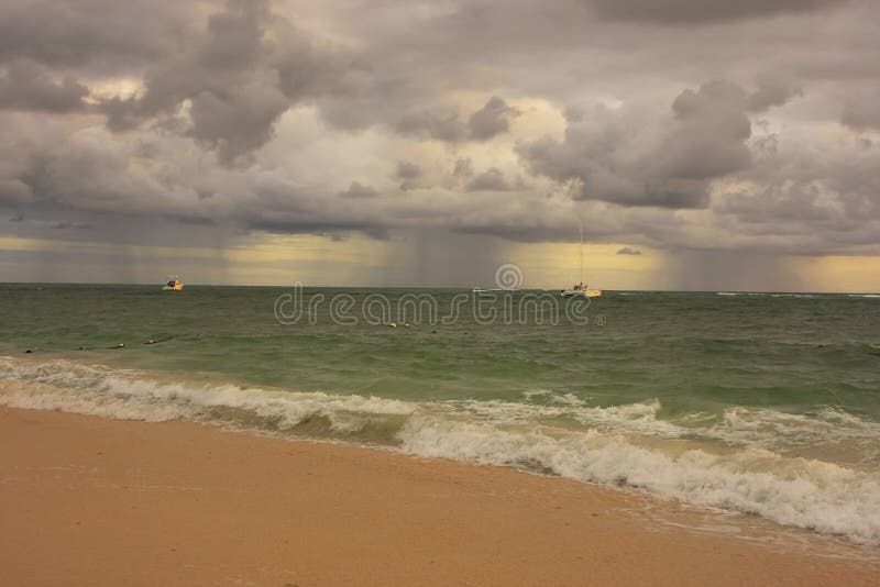 Rainstorm in a Sea at Sunrise Stock Photo - Image of hispaniola ...