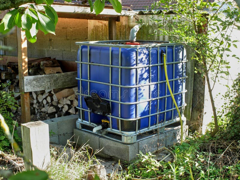 Rainwater collection tank, stock image. Image of outdoor - 259153573