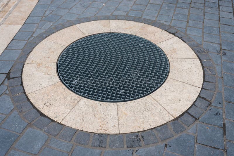 Rainwater drainage grate stock image. Image of flood - 115051727