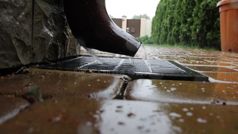 Rainwater Drains from a Drainpipe during a Rainfall. Stock Footage ...
