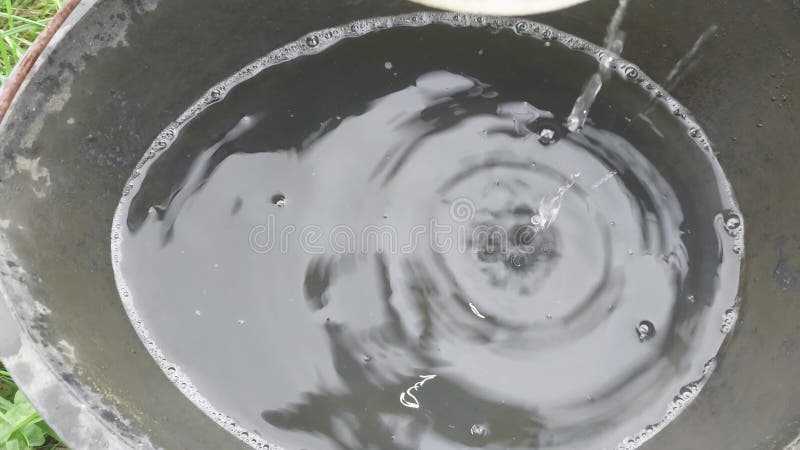 Rainwater Dripping from a Drain into a Bucket Stock Footage - Video of ...