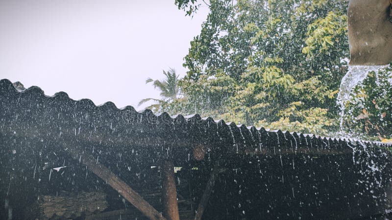 Rainwater Falls on the Roof Stock Image - Image of reflection, rock ...