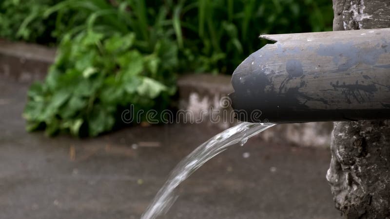 Rainwater Flowing into the Paralon Pipe during the Day Stock Footage ...