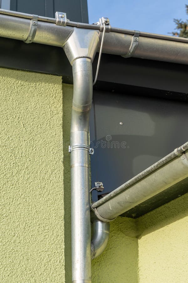 Rainwater Pipe or Downpipe at a Building Stock Photo - Image of green ...
