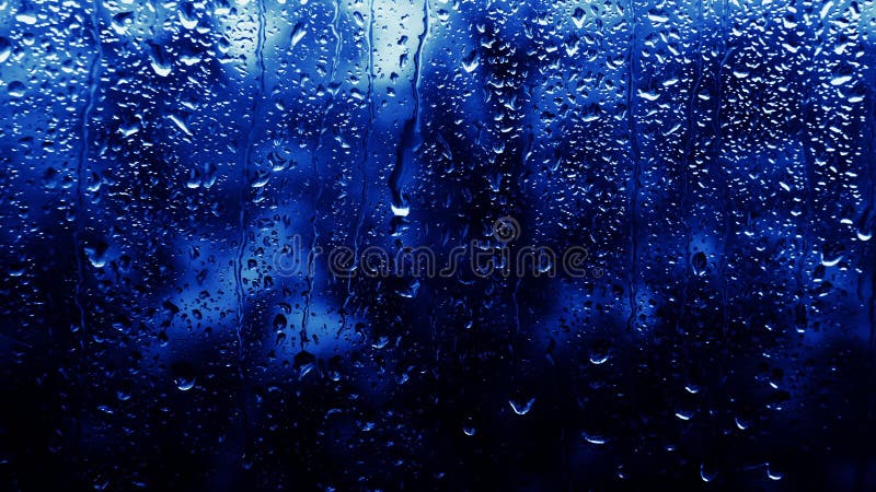 Rainy Background Neon Blue Color, Drops Flow Down the Glass, Copy Space ...