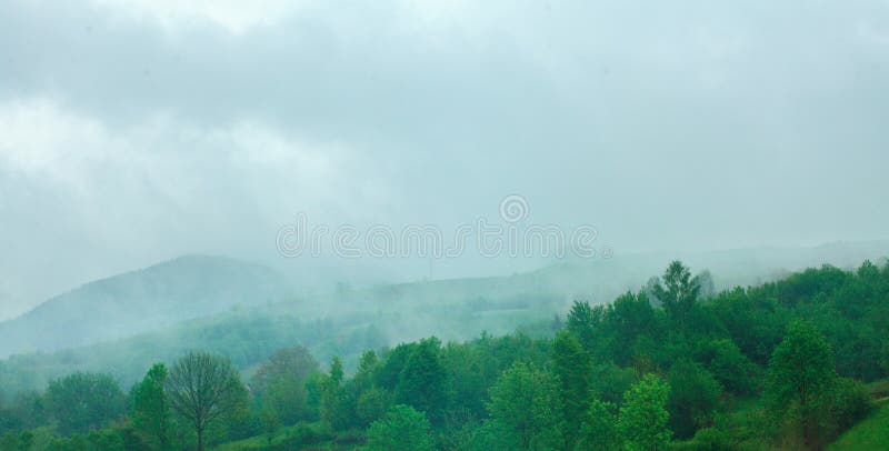 Rainy Cloudy Landscape of Green Mountains Stock Photo - Image of cloud ...