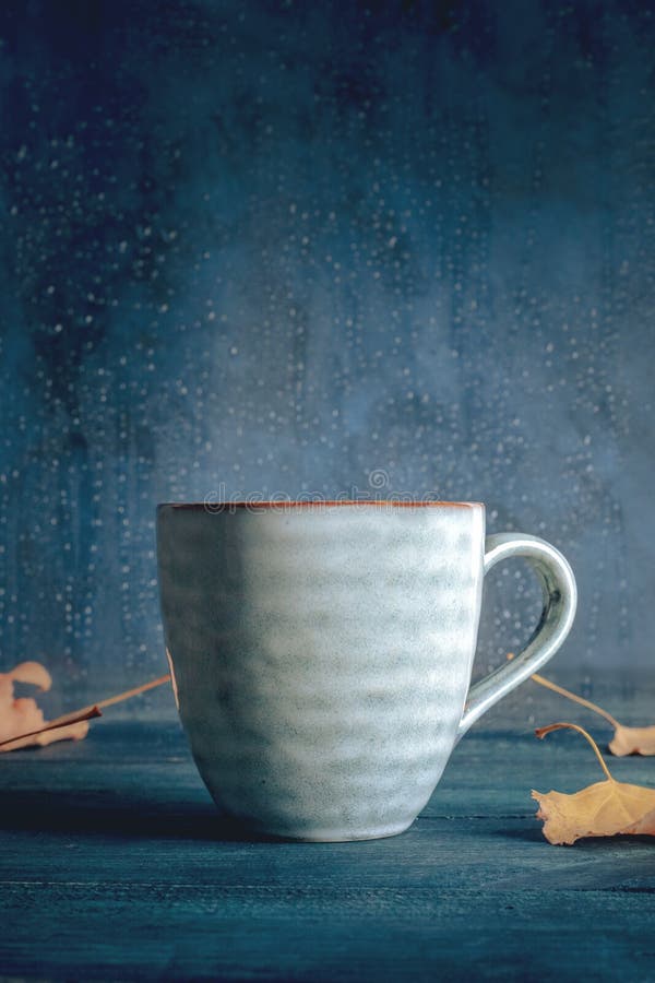 Rainy Day. a Cup of Tea with Autumn Leaves and Raindrops Stock Image ...