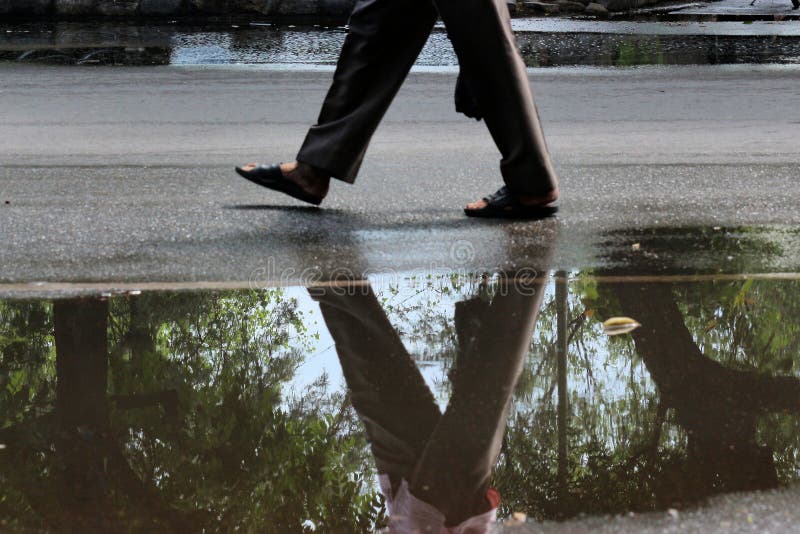 After rainy day stock photo. Image of legs, street, walking - 95292812