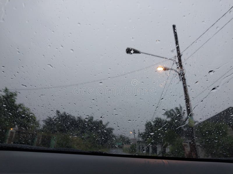 Rainy day night stock image. Image of line, winter, streetlight - 262721311