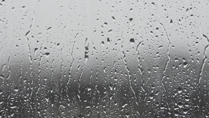 Rainy Day, Raindrops Dripping on the Window Glass Stock Footage - Video ...