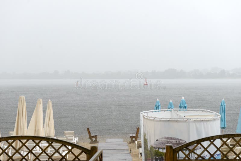 Rainy day at the resort stock photo. Image of chair, rain - 41172534