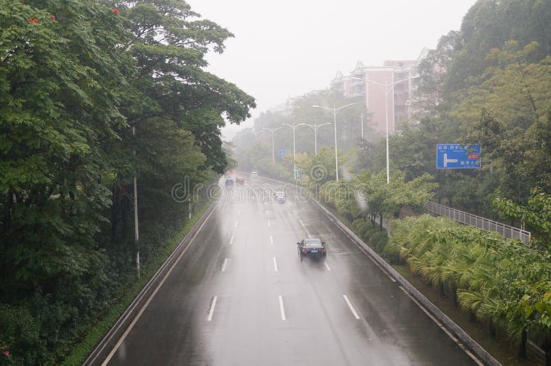 Rainy Day Road Traffic editorial image. Image of baoan - 65161245