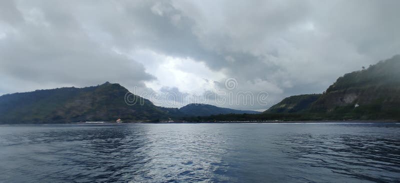Rainy Season Ocean and Mountain View Stock Photo - Image of reflection ...