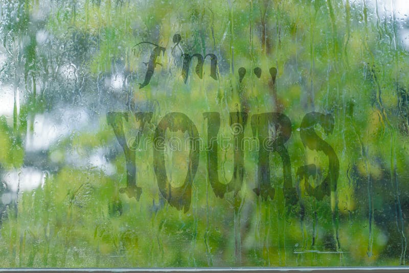 Rainy Text Written on the Foggy Window Stock Photo - Image of blue ...