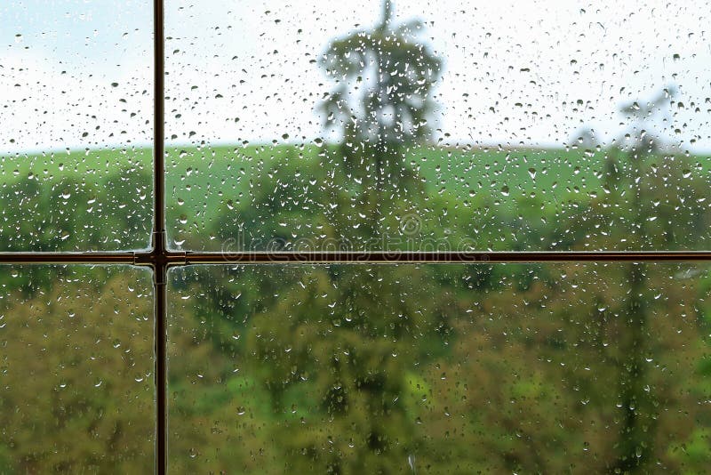 Rainy Weather Behind Wet Glass of a House Window Stock Photo - Image of ...