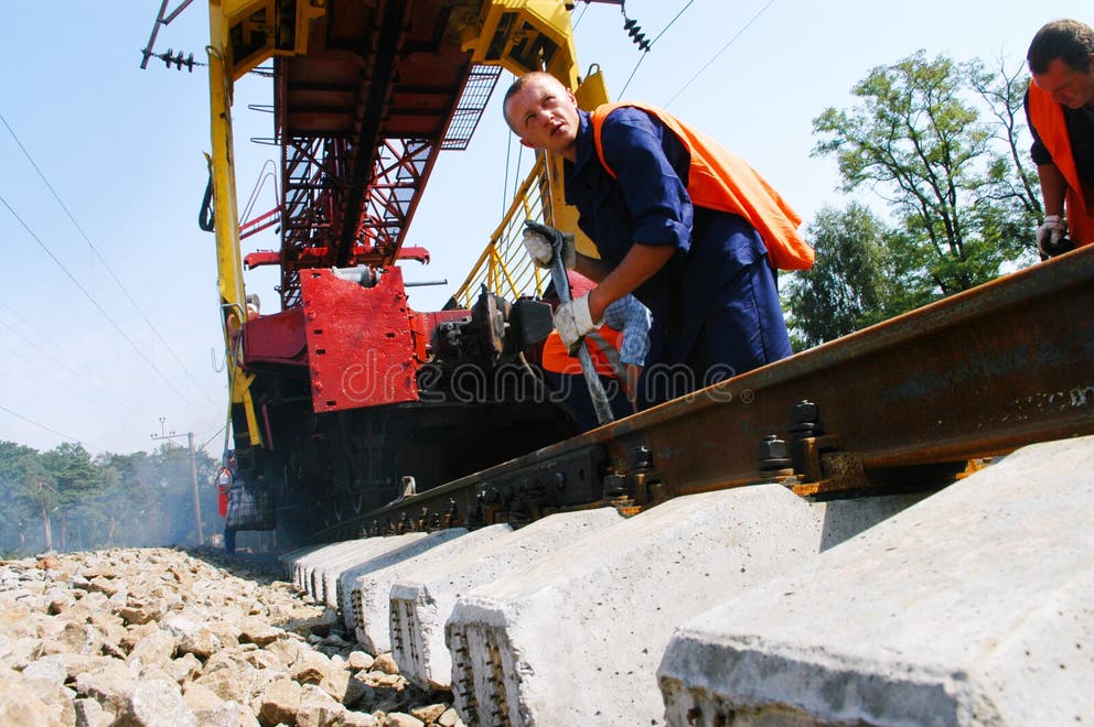 Rairoad Workers editorial stock photo. Image of mask - 13090243