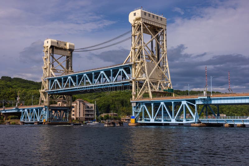 A Raised Double Deck Lift Bridge with Boats Stock Photo - Image of hill ...