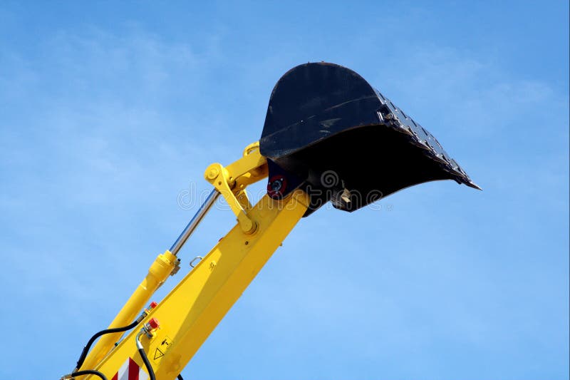 Excavator Scoop Digging Earth at Construction Site Stock Image - Image ...