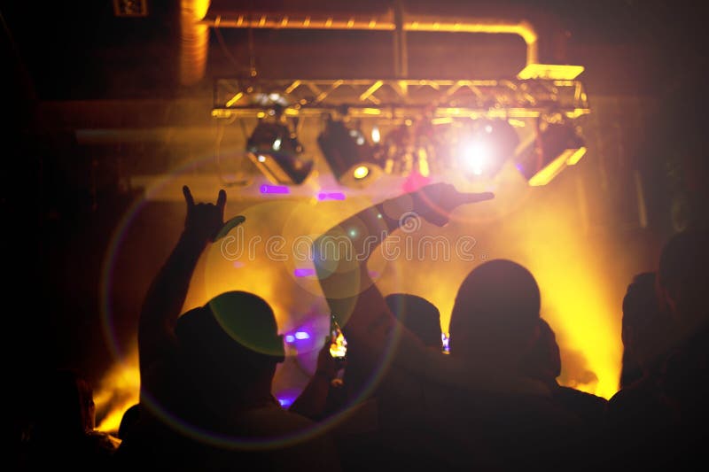 Raised Hands of Crazy People at a Rock Concert, Front and Back ...