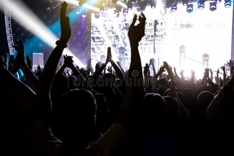 Raised Hands in Honor of a Musical Show on Stage Stock Image - Image of ...