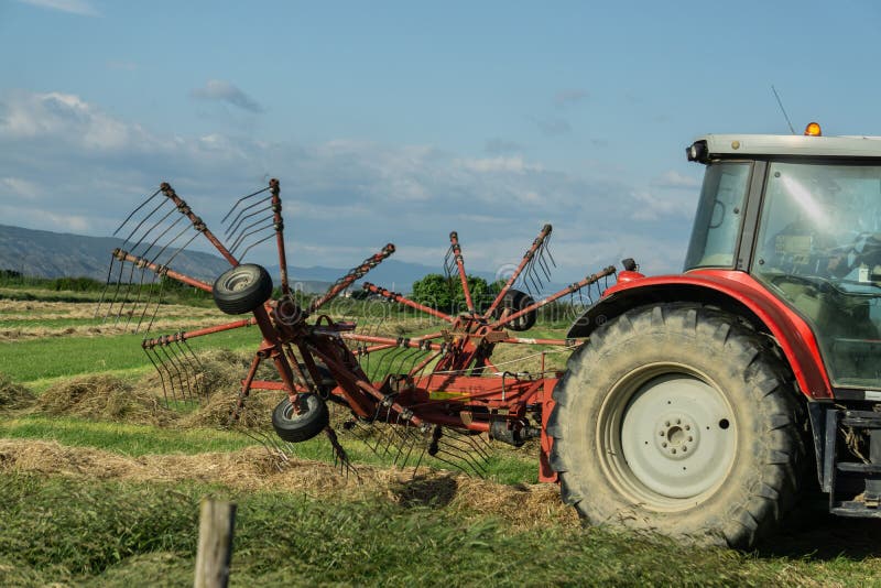 Raised red rake editorial image. Image of field, work - 227269090
