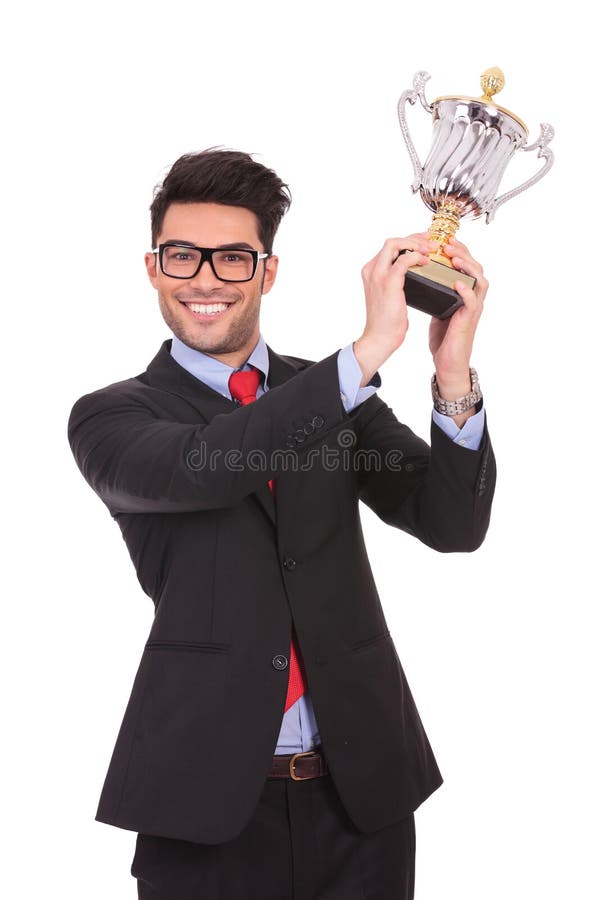 Raising His Trophy & Smiling Stock Image - Image of casual, holding ...