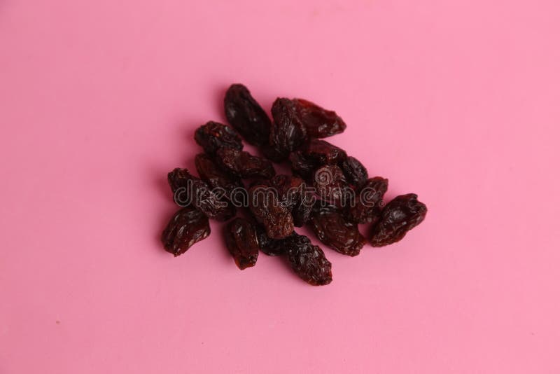 Raisins on a Pink Background Stock Image - Image of nature, dessert ...