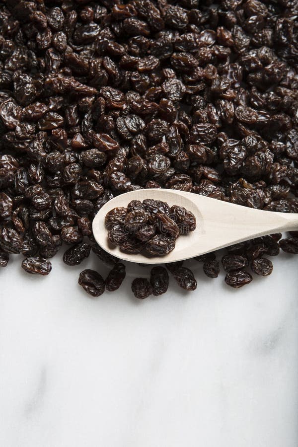 A spoon of raisin stock image. Image of closeup, natural - 55373109