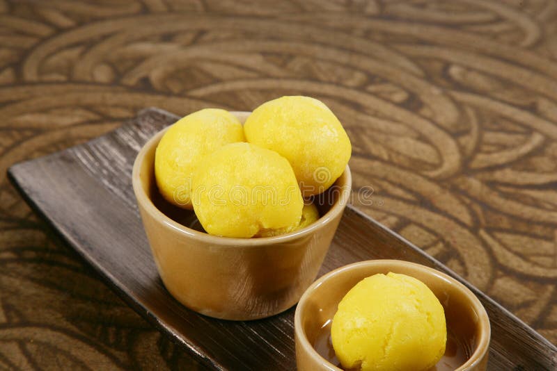 Rajbhog or Yellow Bengali Rasgulla or Cham Cham Stock Photo - Image of ...