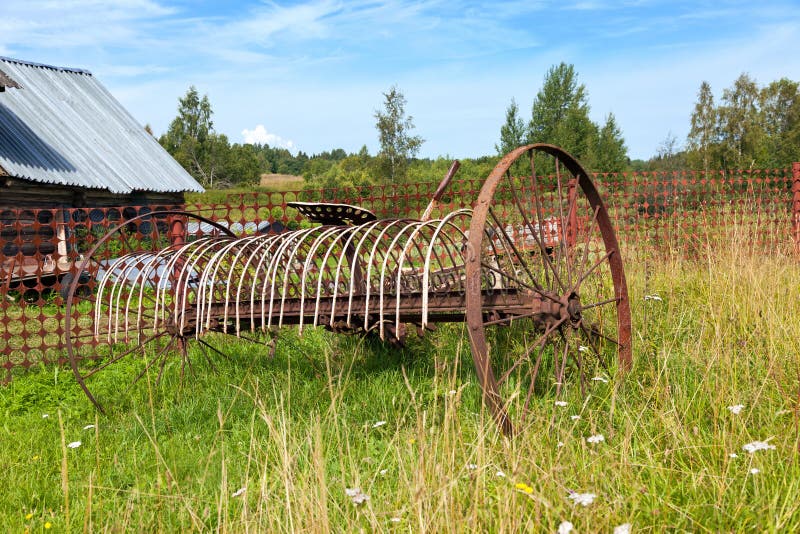 Rake hay in agriculture stock photo. Image of meadow - 26729724