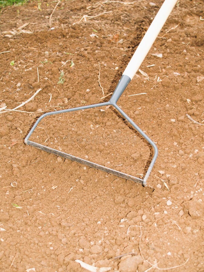 A Rake Raking Soil on the Plot Stock Image - Image of country, asphalt ...