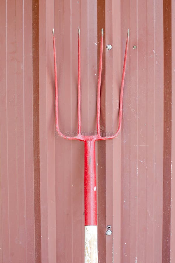 Rake , on Red Wall , Harrow Stock Photo - Image of ground, harrow: 52495594