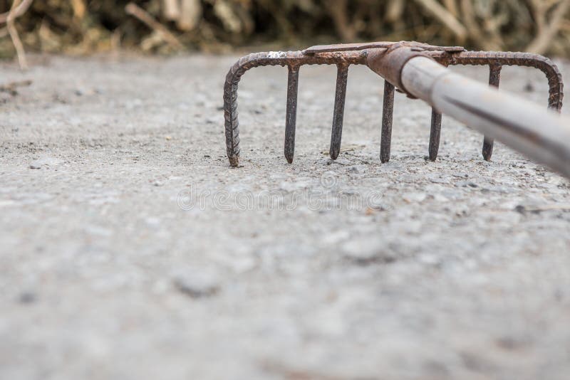 The rake is rusty stock photo. Image of closeup, natural - 130139722