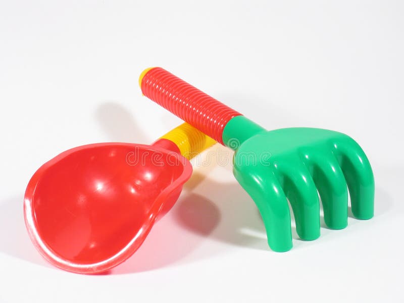 Rake and Shovel crossed II stock photo. Image of plastic - 17486
